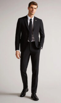 The Essential Style Guide to Wearing a Black Suit | Dapper Confidential